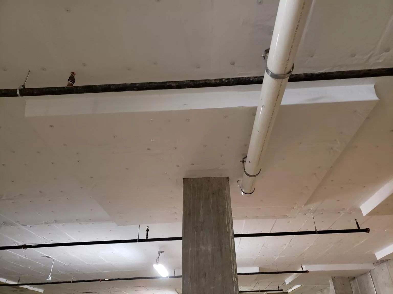 Parking Garage Ceiling Insulation | Enhance Safety & Comfort